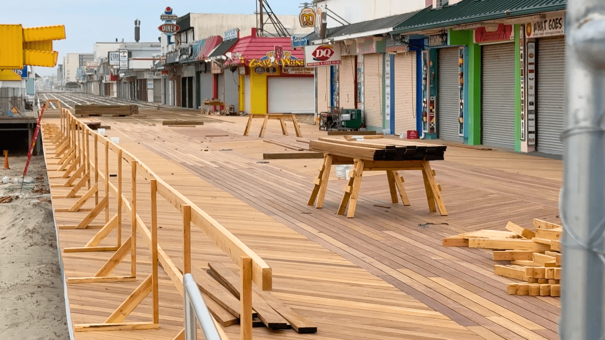 Construction work on a wooden boardwalk near shops. - Wildwood Video ...